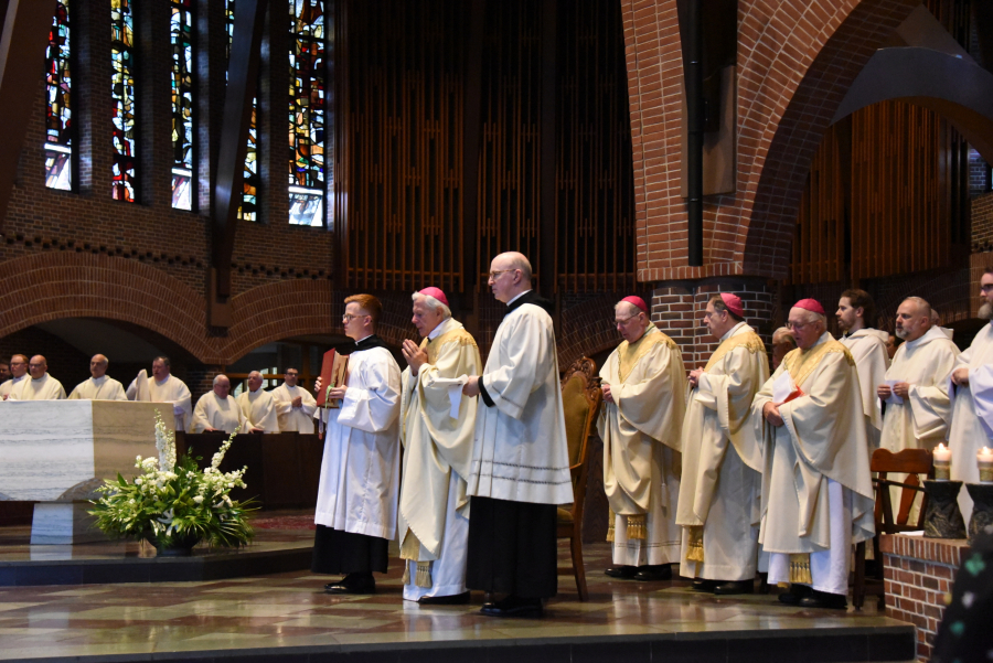 During a Mass of Christian Burial, Bishop Joseph Gerry, OSB, is ...